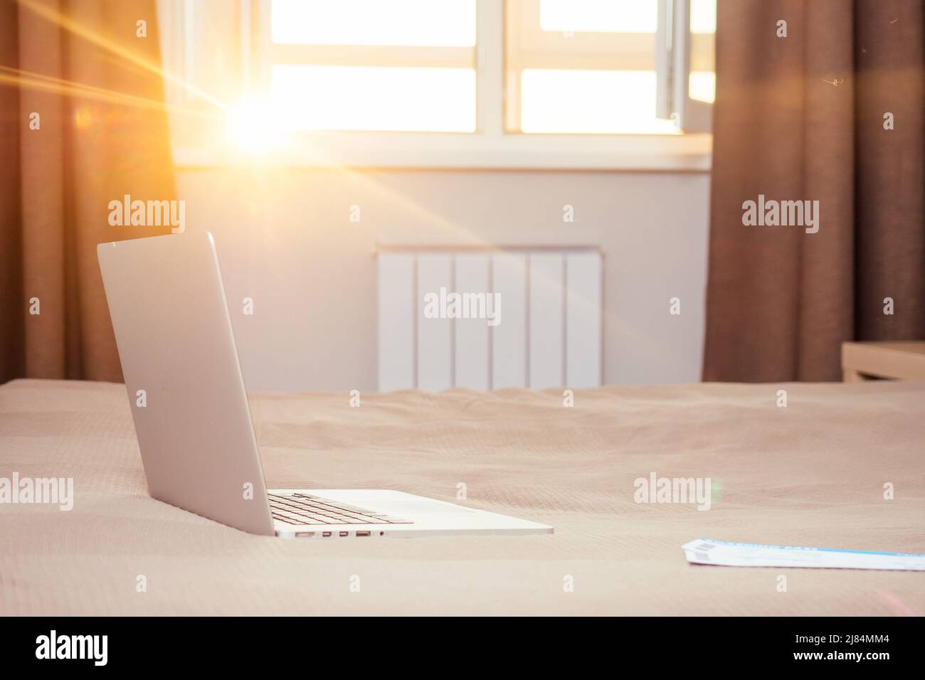 laptop at evening sun set close up in home Stock Photo - Alamy