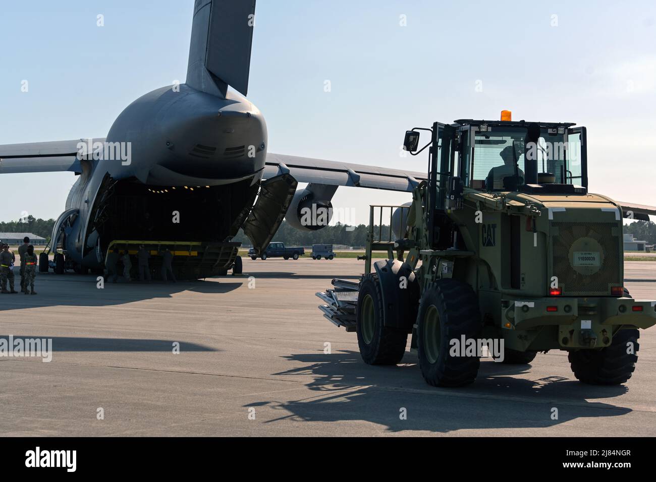 An Airman with the 156th Contingency Response Group, drives a 10K all ...