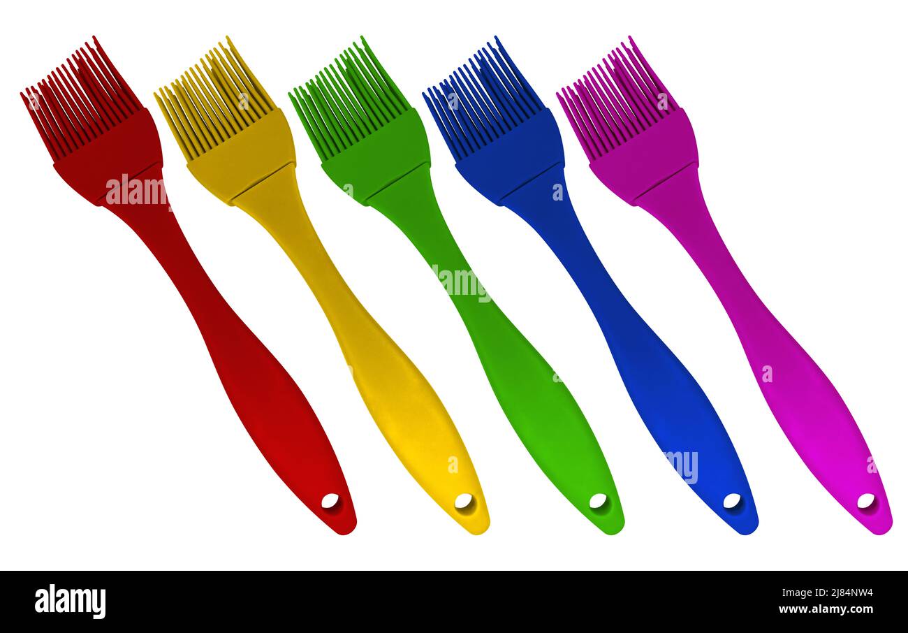 Colorful brushes for greasing the pan with oil. Grease brush on white ...