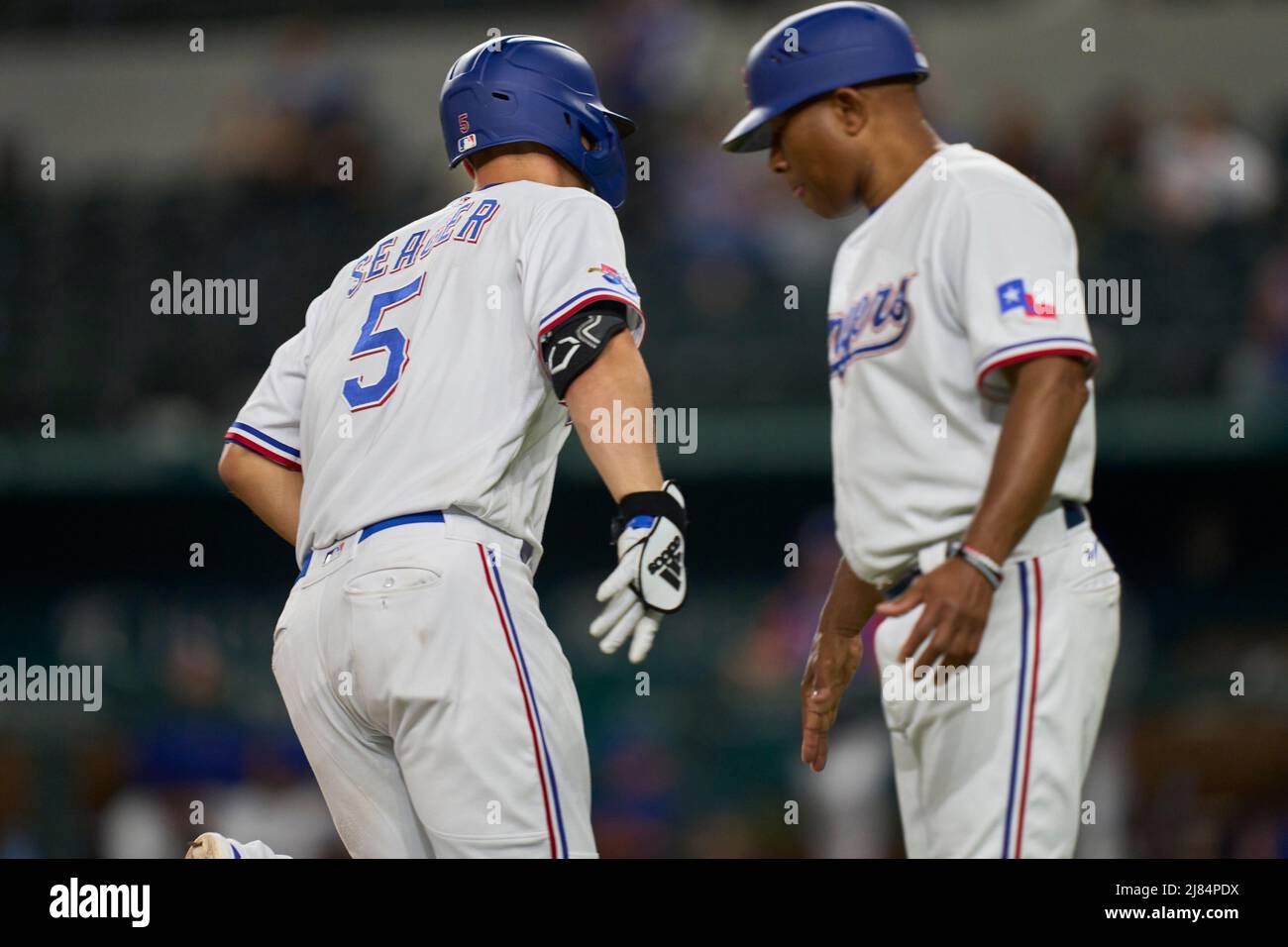 Dallas TX, USA. 11th May, 2022. Texas shortstop Corey Seager (5 )hits a homer during the game ...