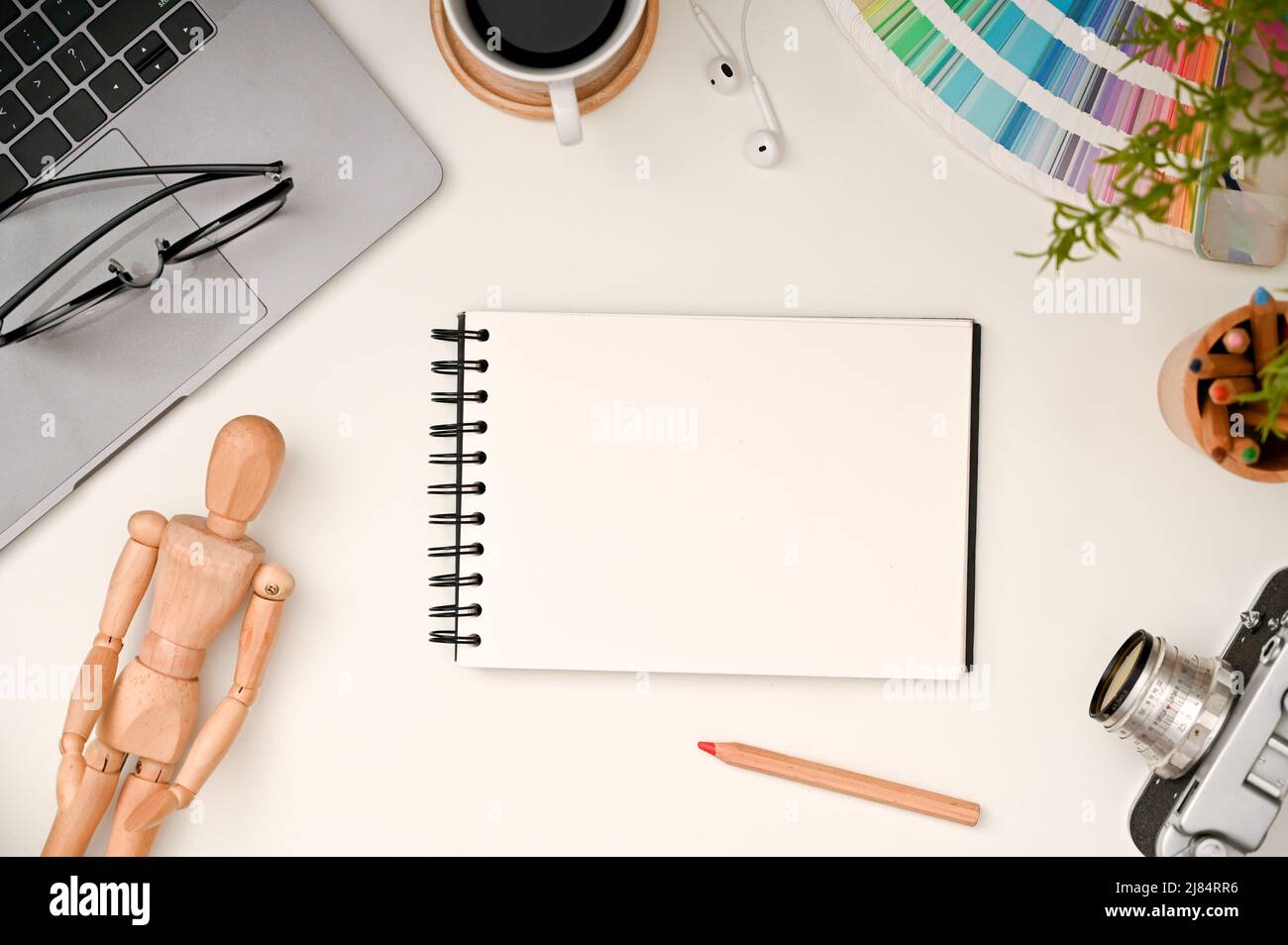 Creative graphic designer workspace on white background with empty ...