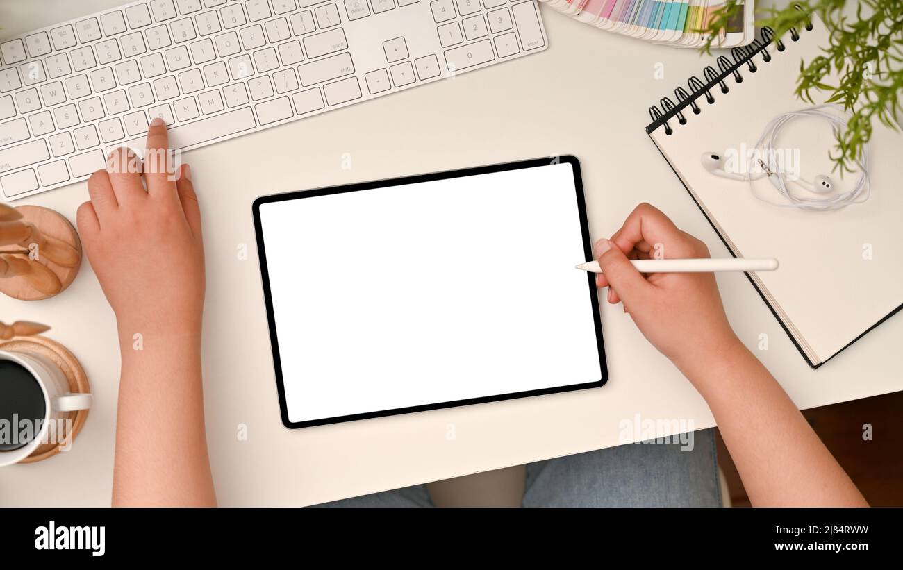 Top view, Flat lay, Female graphic designer using digital tablet ...