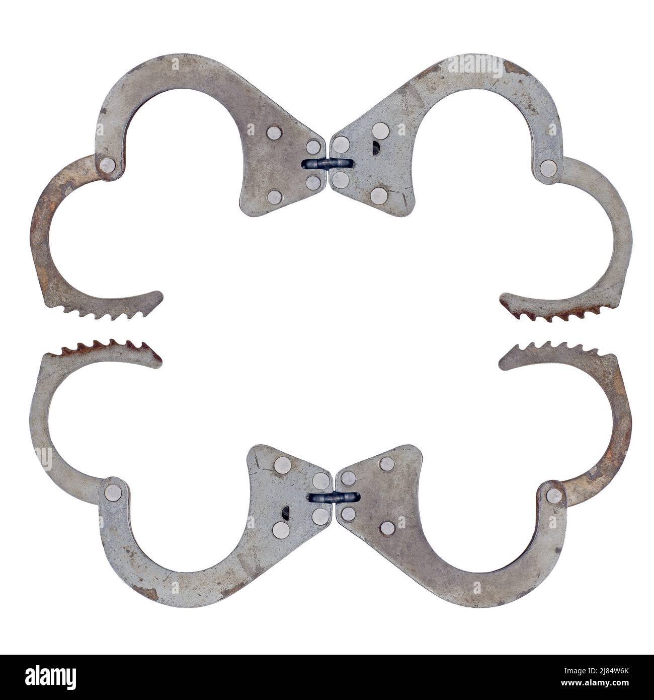 Frame of metal handcuffs. Isolated on white Stock Photo - Alamy