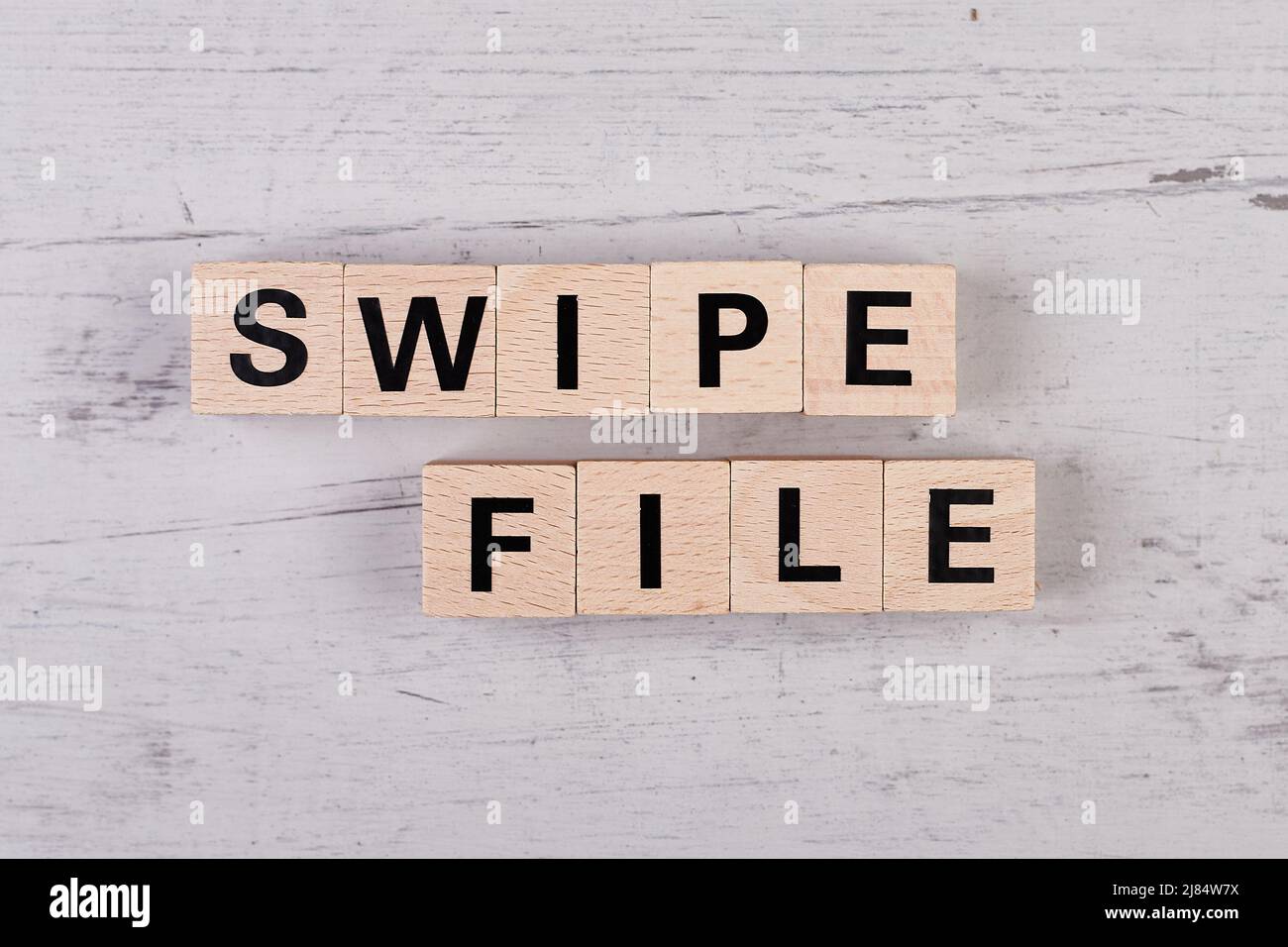 wooden blocks building the word SWIPE FILE Stock Photo - Alamy wooden blocks building the word SWIPE FILE Stock Photo - Alamy