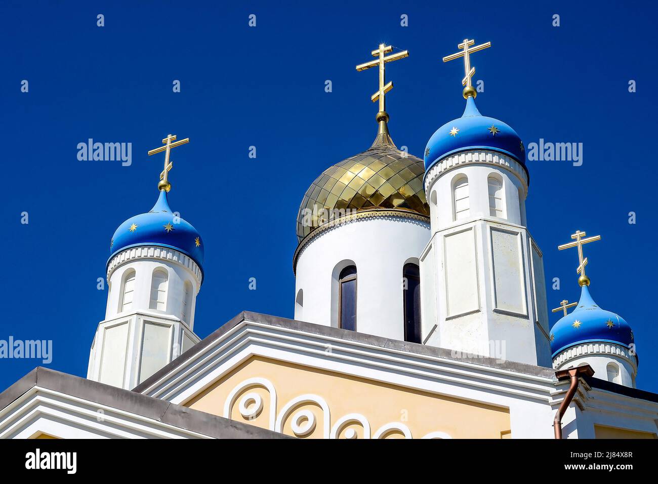 Golden domes of the Russian Orthodox Church against the blue sky Stock ...