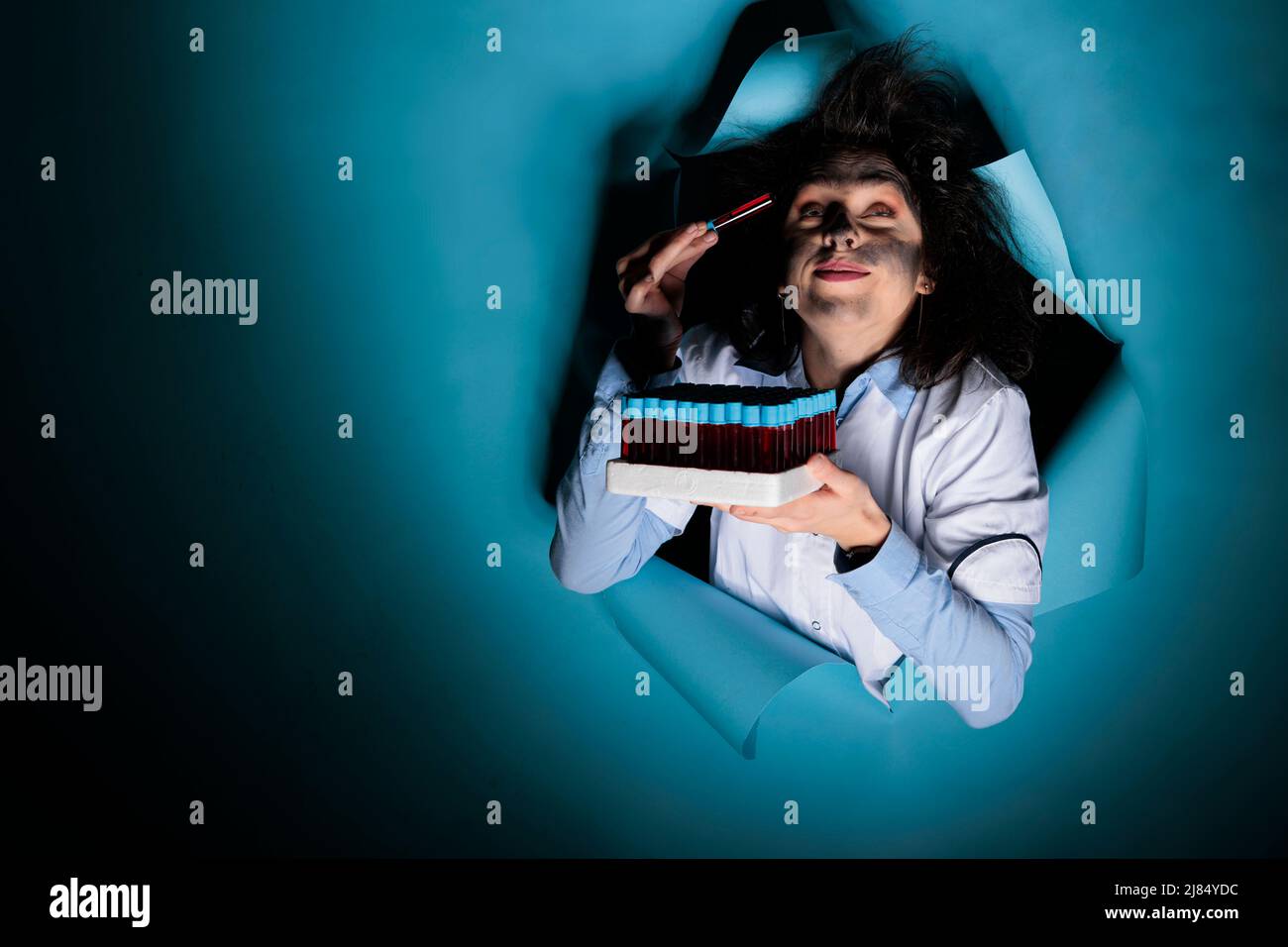 Mad silly biochemist with messy hair and funny face reaction after ...