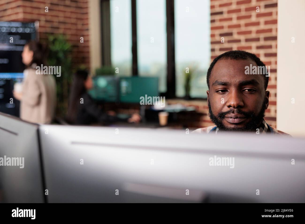 African American Programmer Developing High Security Application With Multiple Layers Of
