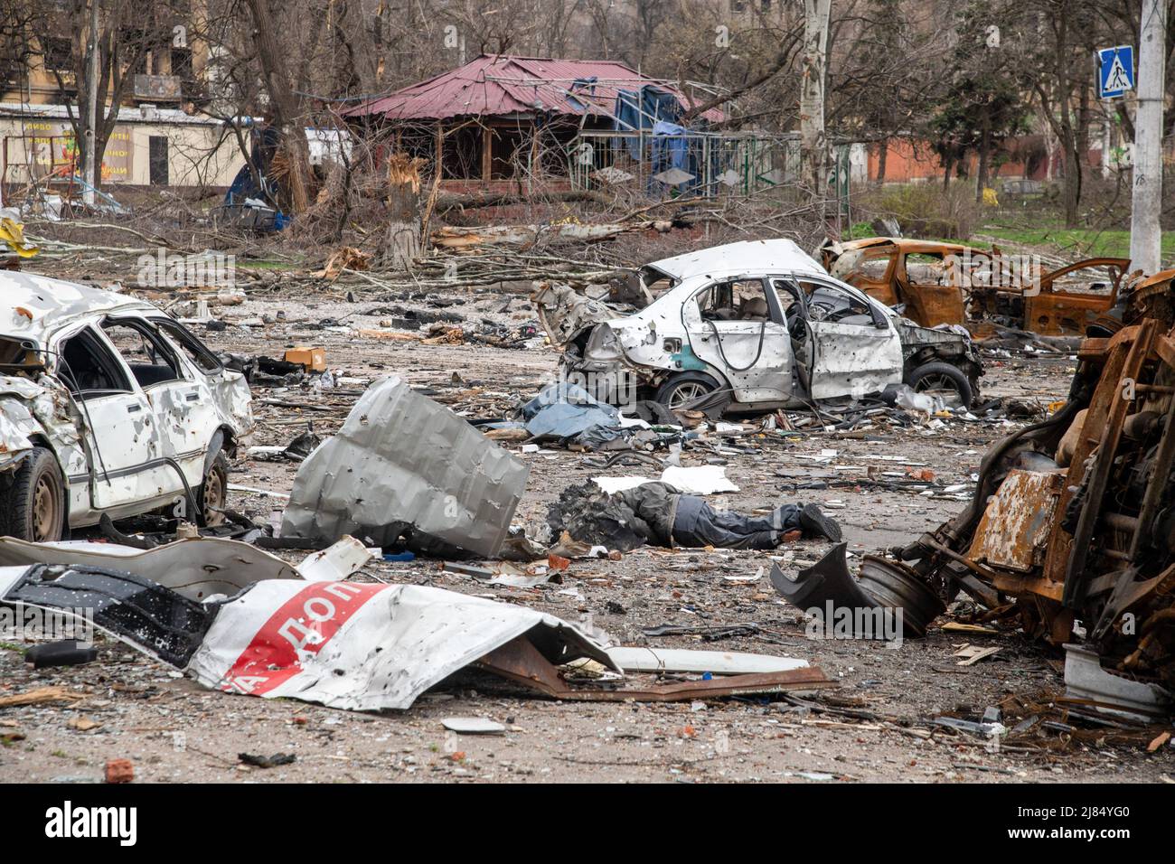 (EDITORS NOTE: Image depicts death)Bodies and scrapped vehicles on the ...
