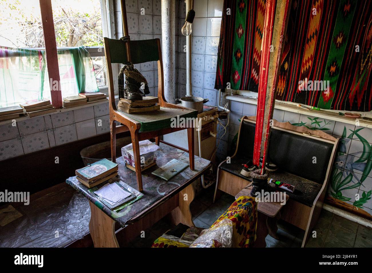 Wooden sticks and temporary fixes to support the rooftop of Alina (12 ...