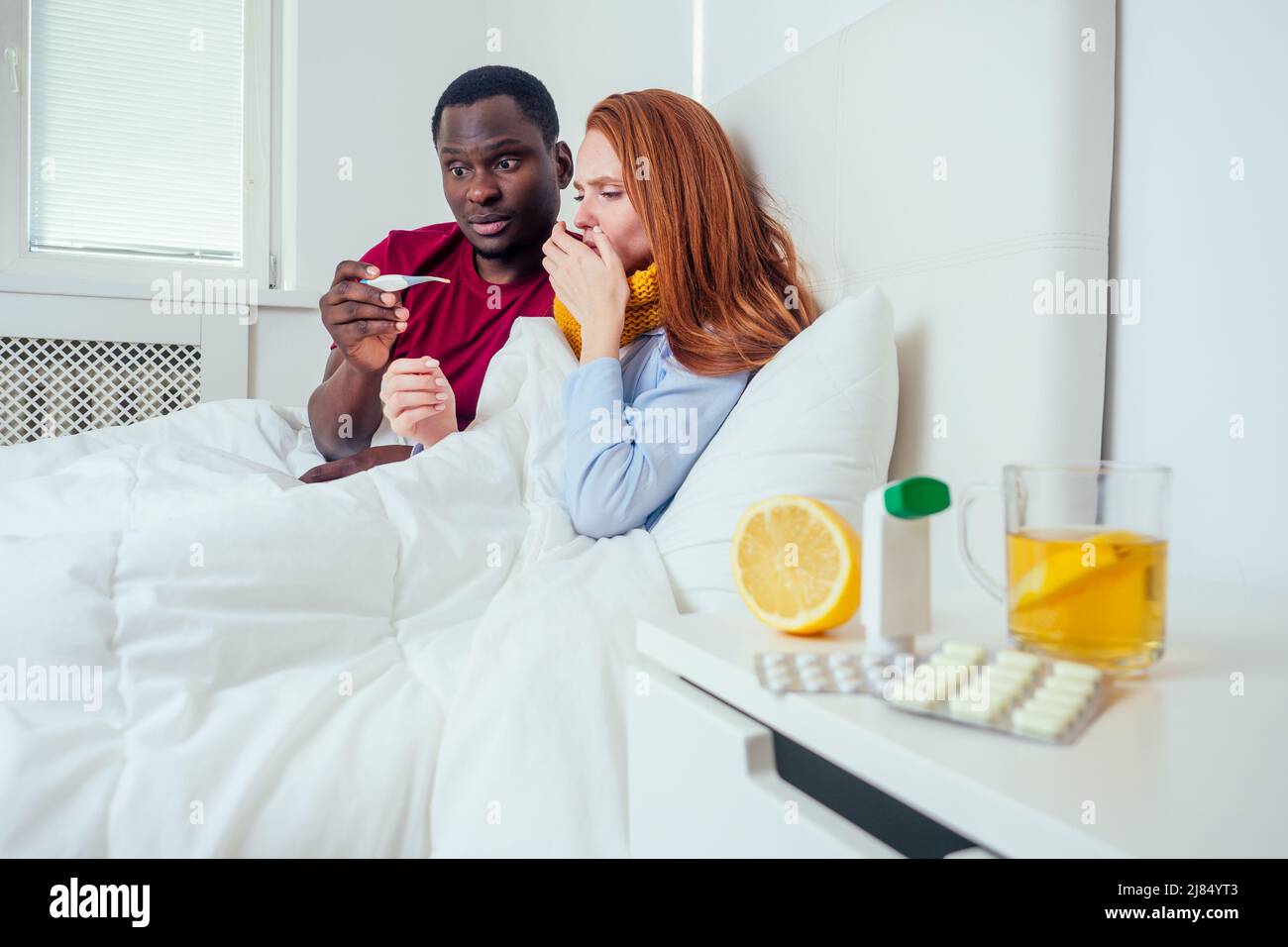 Sick together. Young latin hispanic man and redhaired ginger woman ...