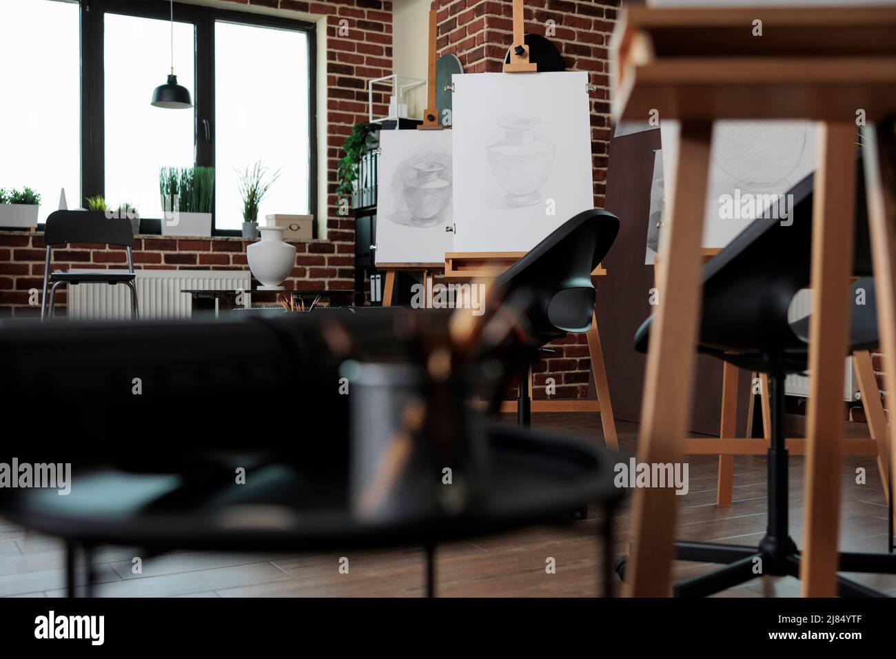 Empty drawing studio equipped with professional sketching tools ready ...