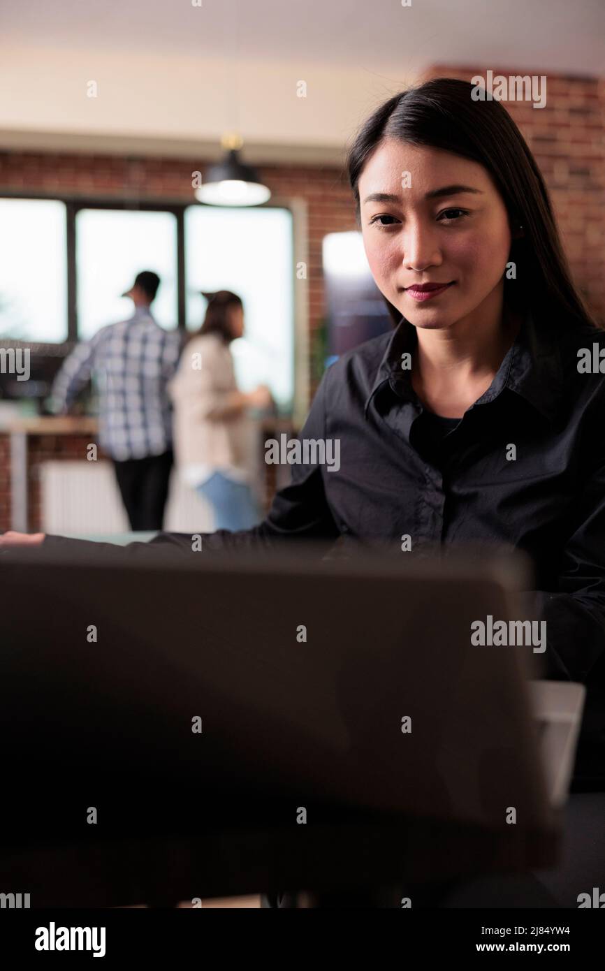 Cyber officer encrypting big chunks of data in order to secure important files. Confident cyber ...