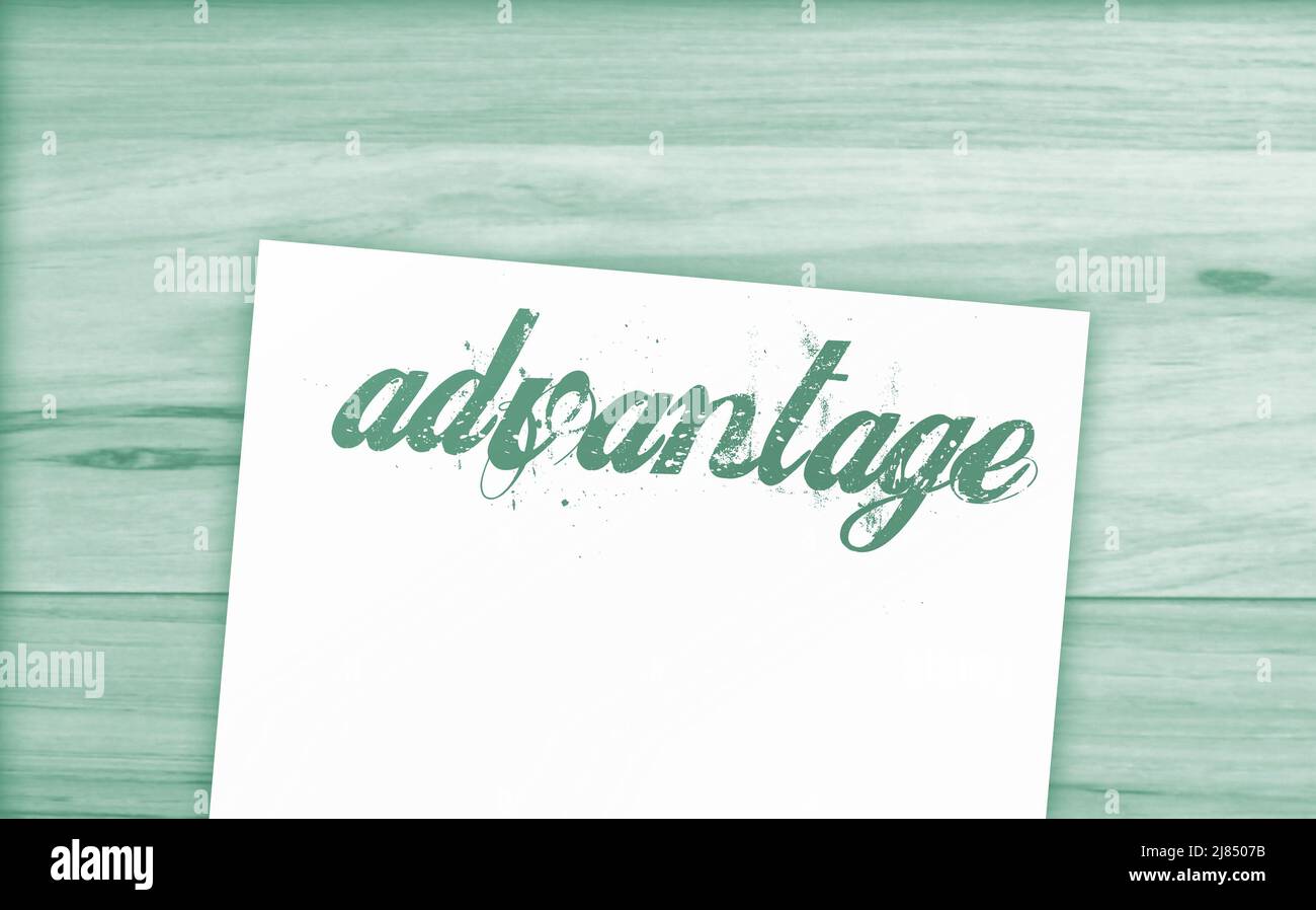 Advantage word on page and paper dollar signs around on wooden table ...