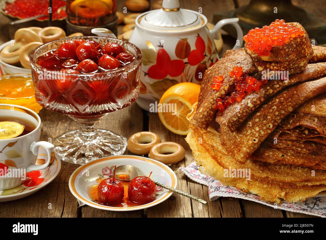 Pancakes with red caviar and samovar tea Stock Photo - Alamy