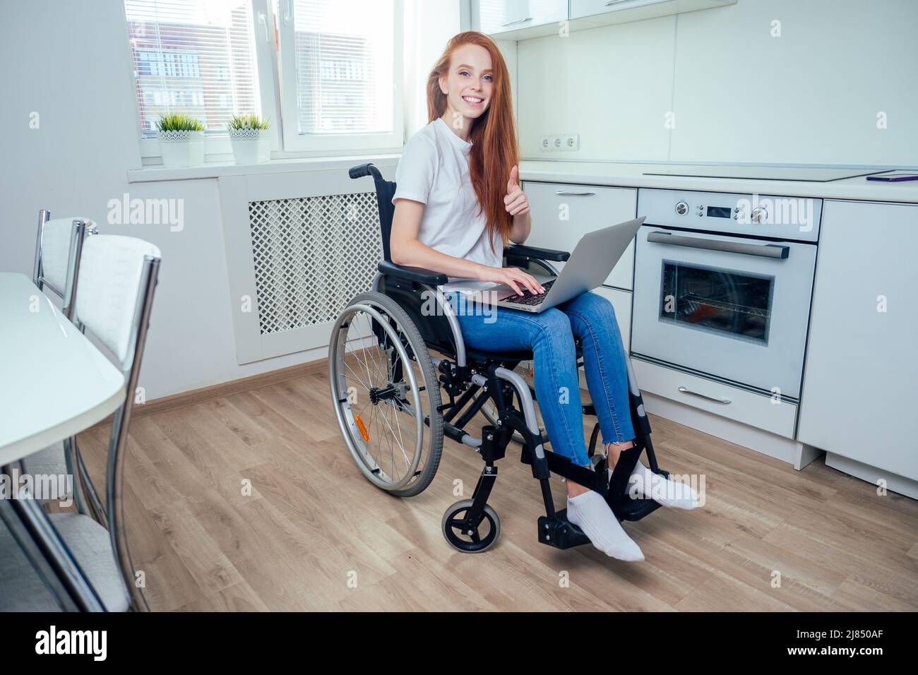 Disabled girl in wheel chair hi-res stock photography and images - Alamy