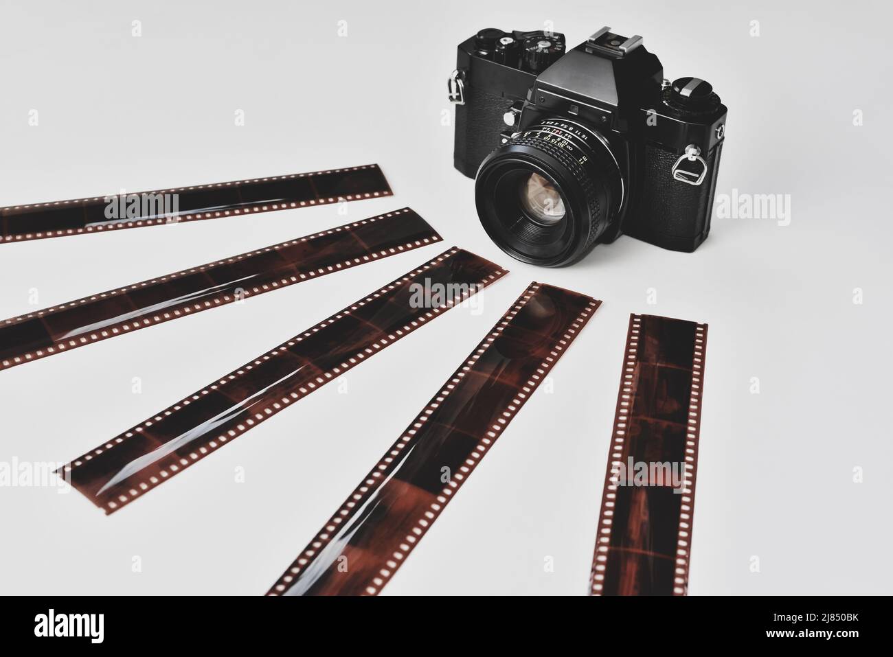 Vintage analog film camera and film negatives Stock Photo - Alamy