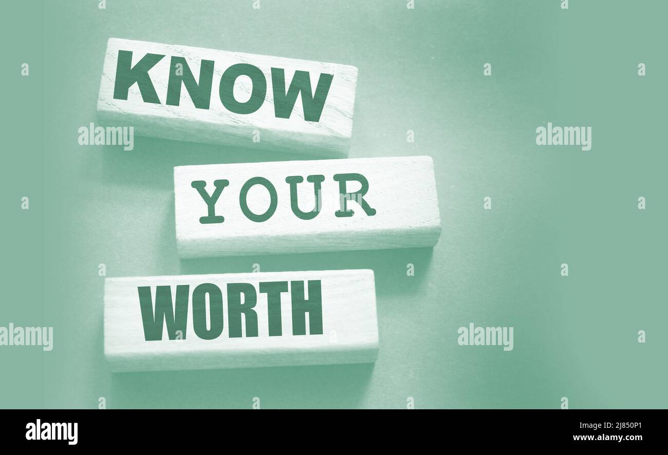 Know Your Worth on wooden blocks. Self motivation coaching HR concept ...