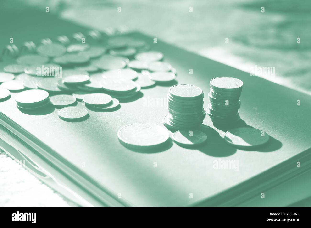 Assorted piles of coins. Money concept, currency or business profit ...