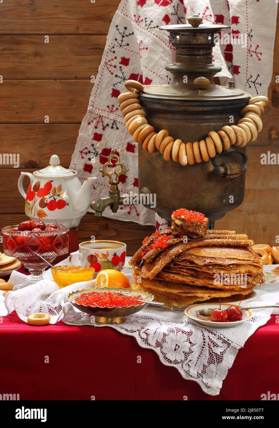 Pancakes with red caviar and samovar tea Stock Photo - Alamy