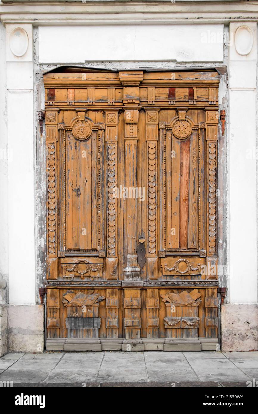 Doors and entrance to an old building. Ancient medieval old wooden ...