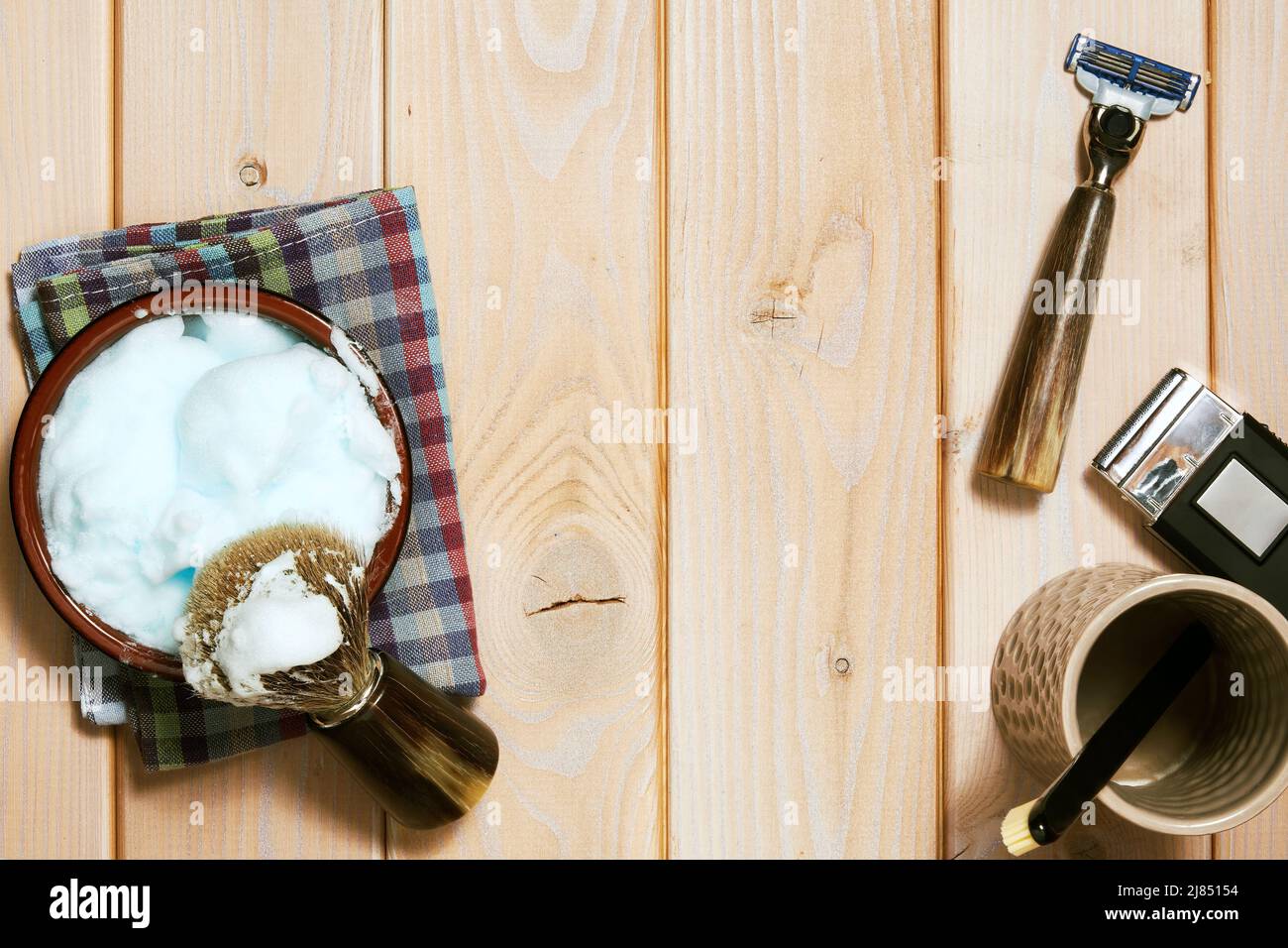 Flat lay template with shaving tools, razor blade, gel, brush and bowl ...