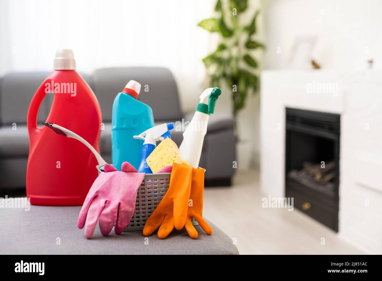 Assorted cleaning products on white background Stock Photo - Alamy