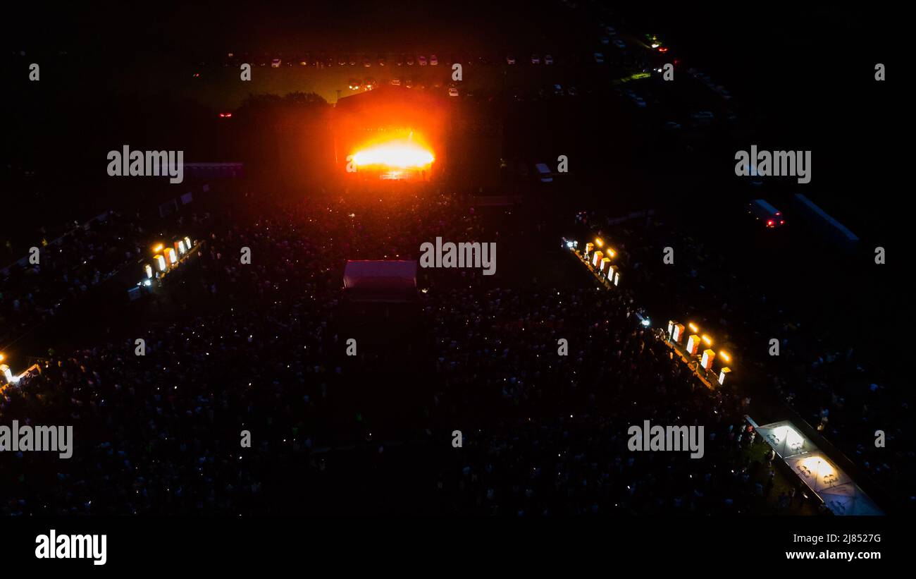 open concert in the field at night Stock Photo - Alamy