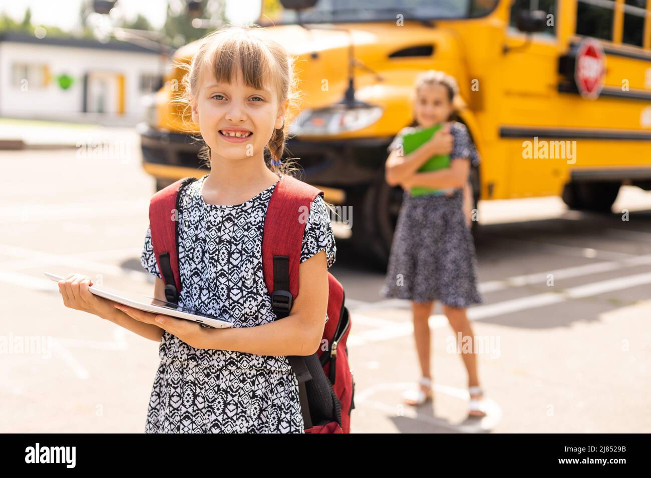 Back to school. First day of school. Two teenage girs at the school ...