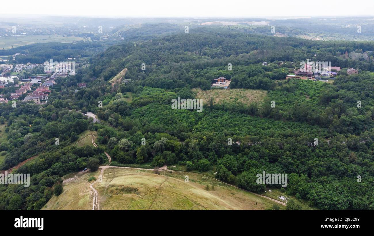 Extensive rural landscape with patches of fields, orchards and hedges ...