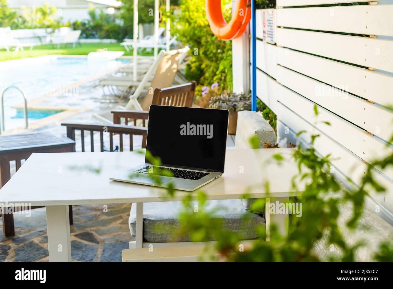 computer on table background as a pool Stock Photo - Alamy