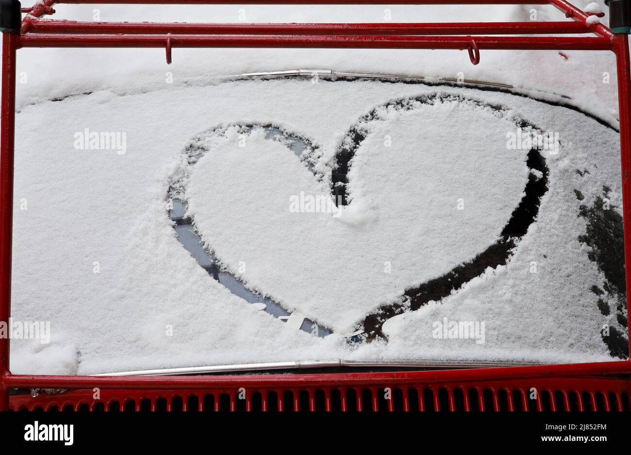 heart shape on the window of a snow-covered car Stock Photo - Alamy
