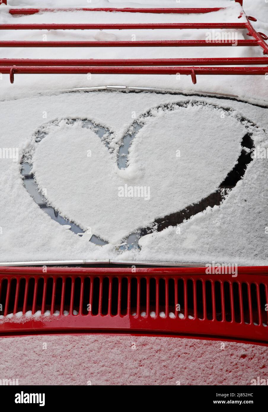 heart shape on the window of a snow-covered car Stock Photo - Alamy