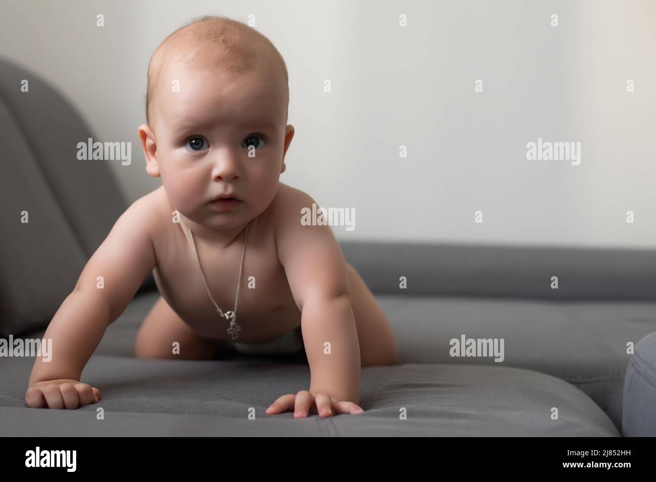 baby on the couch at home Stock Photo - Alamy