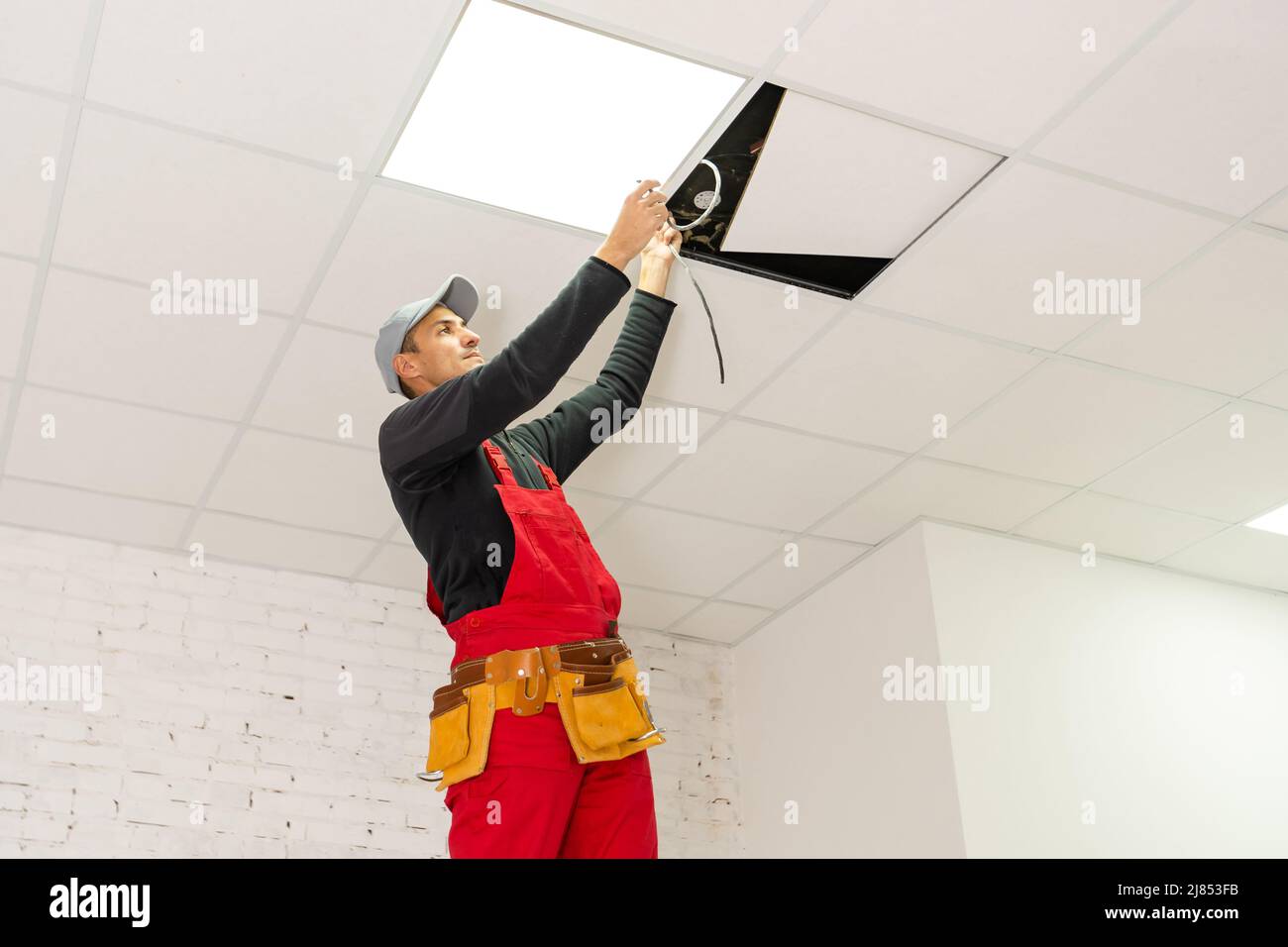 Ceiling installation with expert technicians In the room that is in the ...