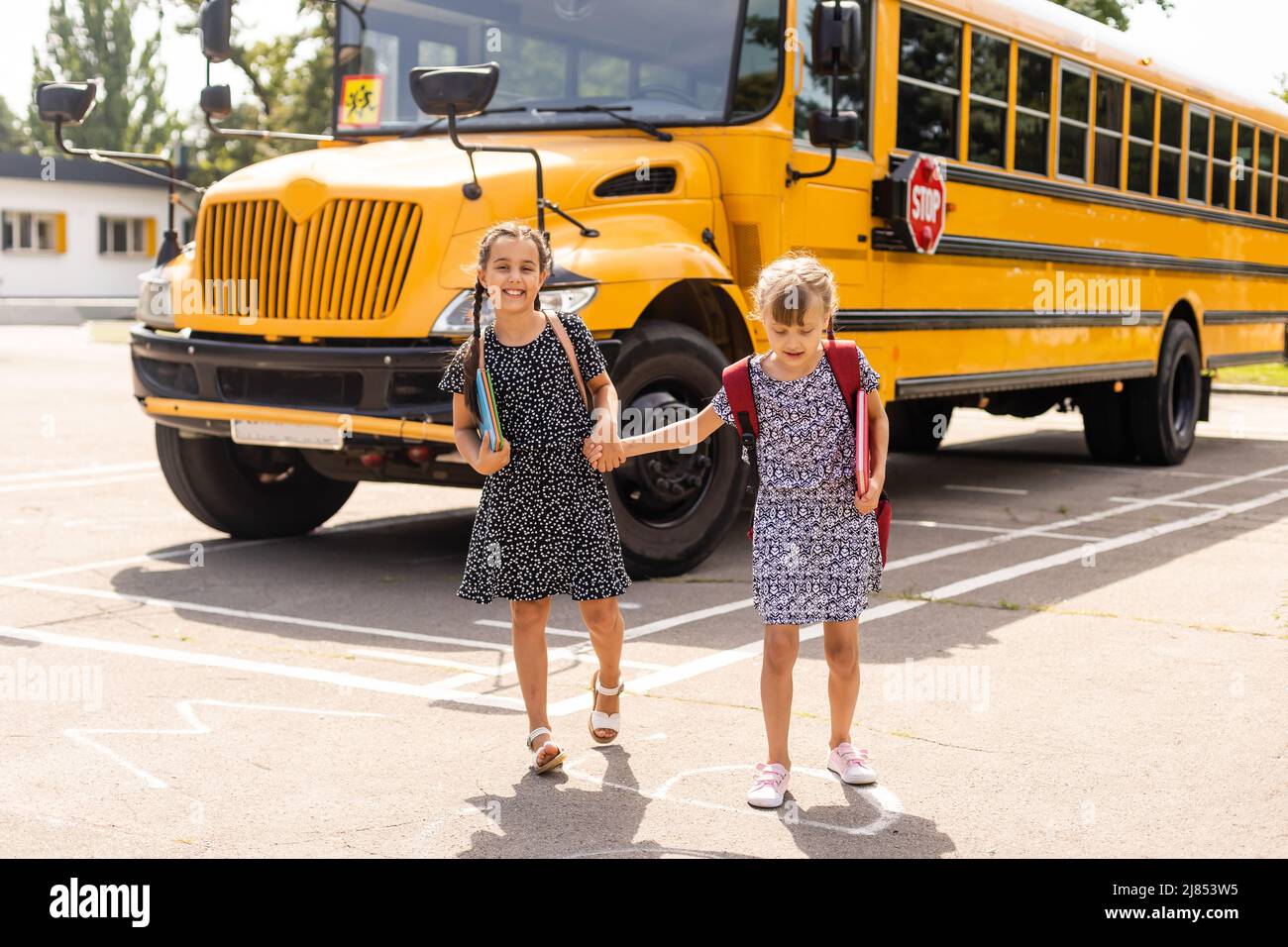Child running school bus hi-res stock photography and images - Alamy