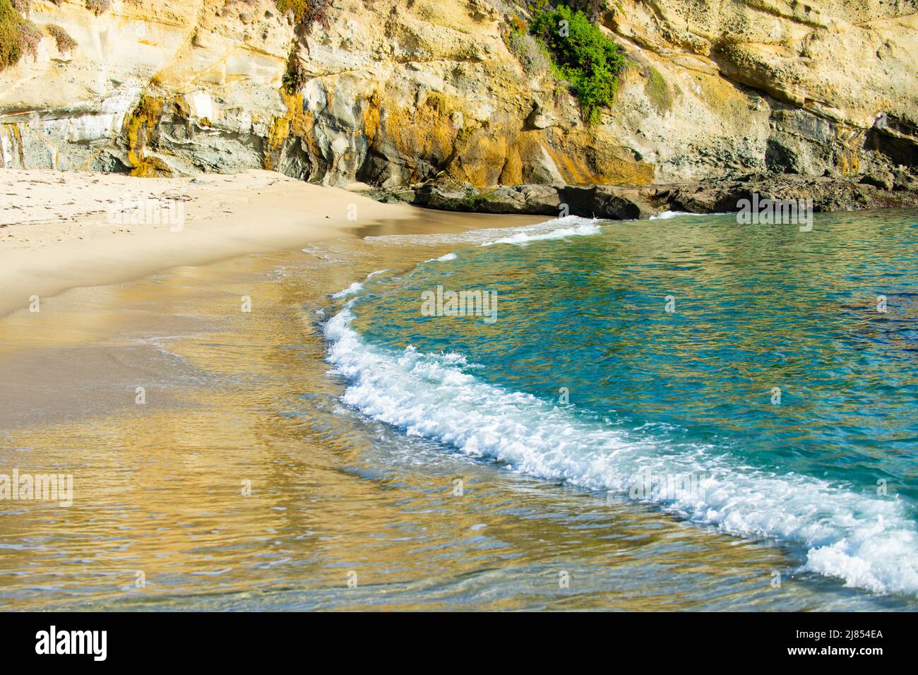 Summer beach, ocean waves on a tropical sea with deep blue wawes. Calm ...