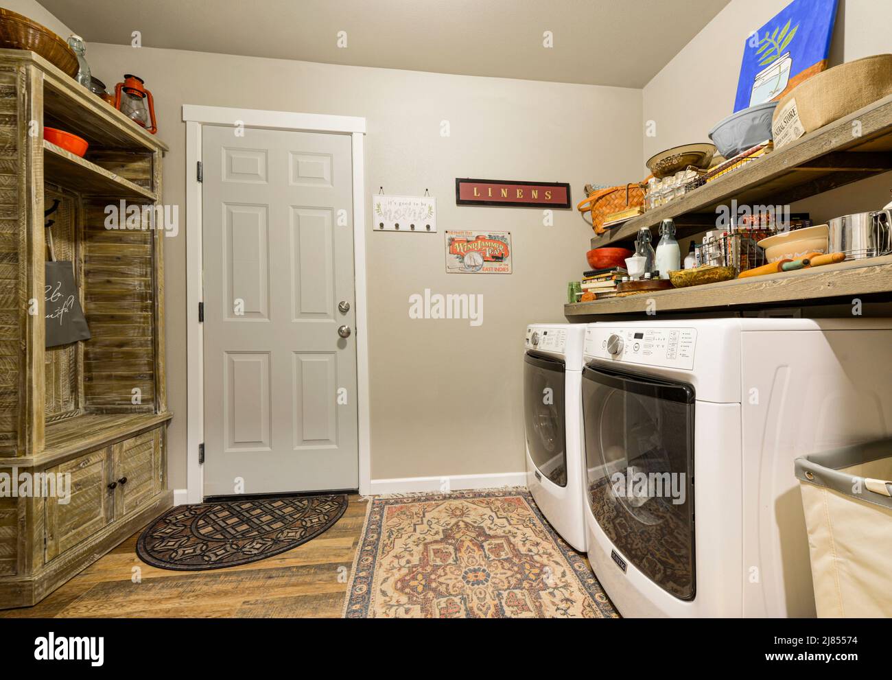 Modern residential laundry room interior Stock Photo - Alamy