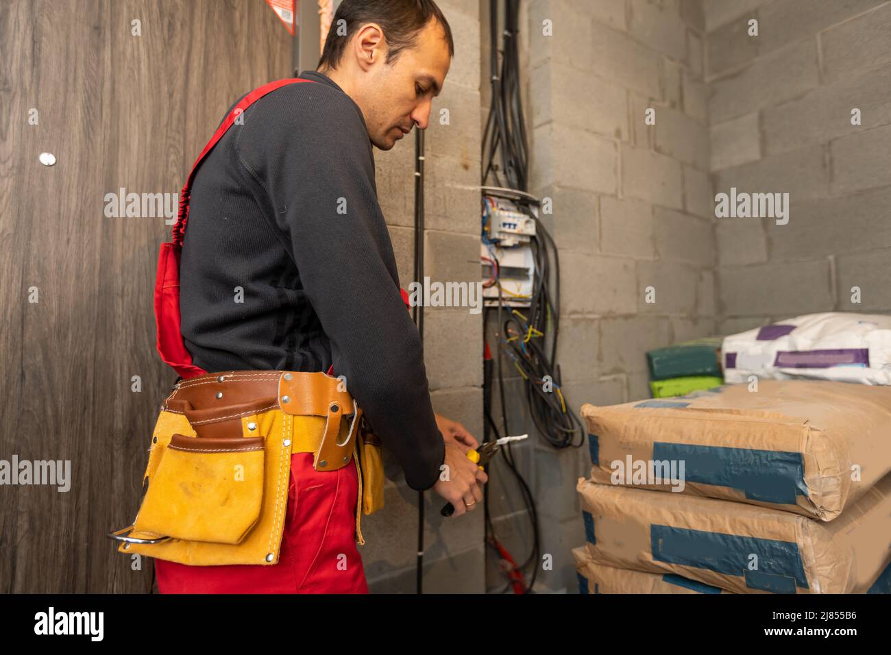 worker finding tools in construction box in wrepair worke in working ...