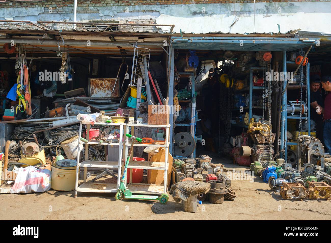 A store packed with junk, computer parts and other stuff. At the ...