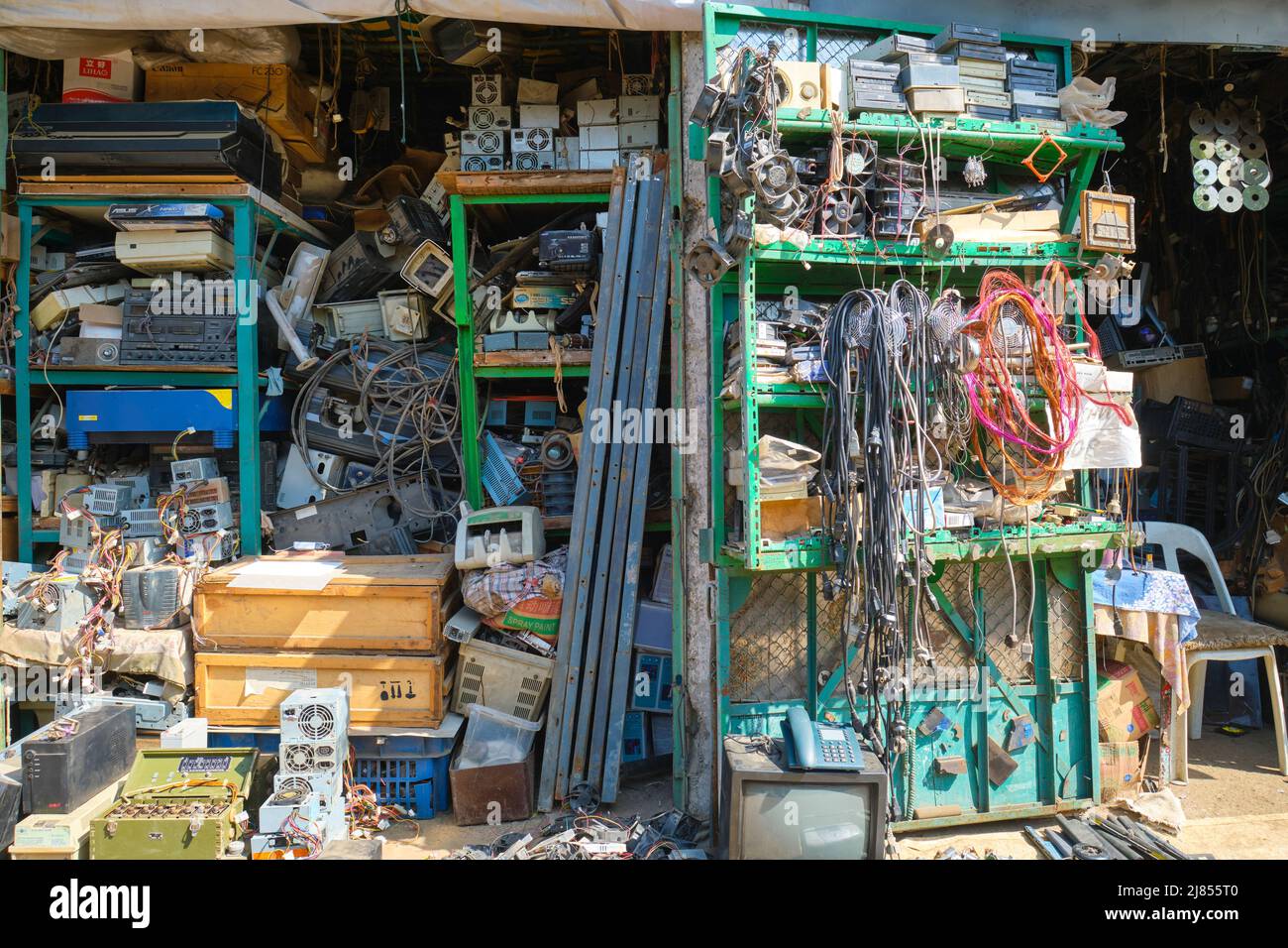 A store packed with junk, computer parts and other stuff. At the ...