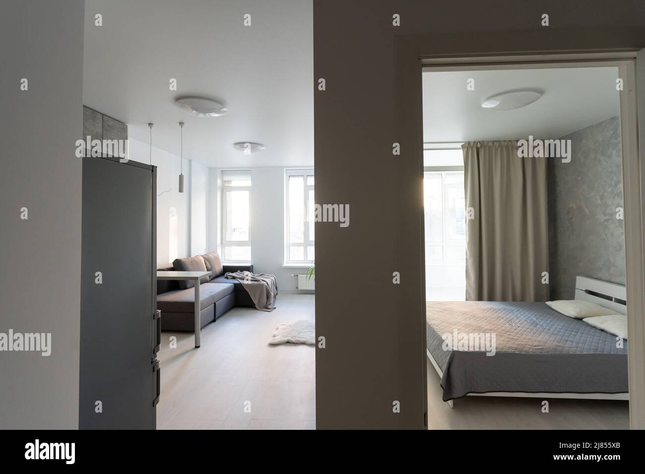 Modern minimalistic dark gray loft style studio apartment interior ...