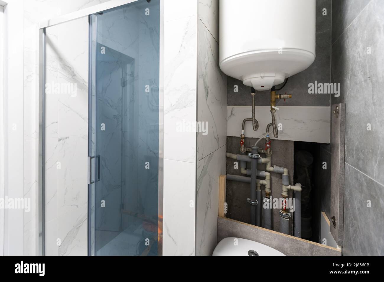 Water pipes, valves and manometers inside house, system with electric ...