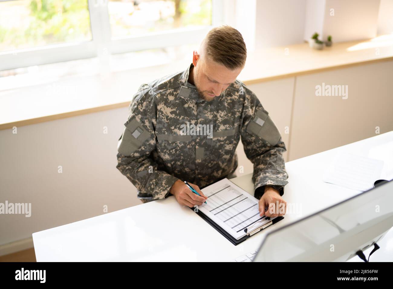 Military Student Education. Army Soldier Veteran With Computer Stock ...