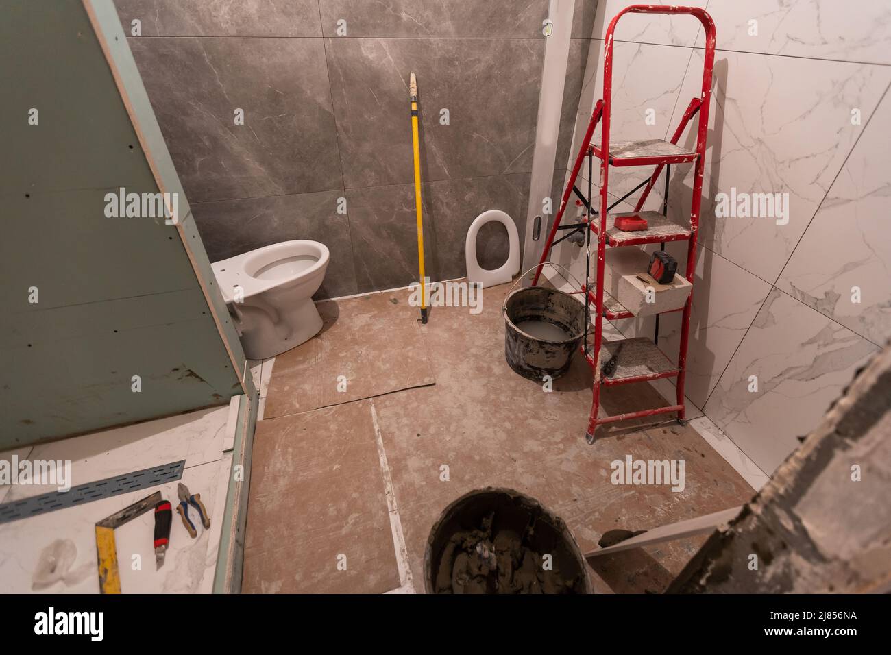 bathroom renovation and tiling, construction Stock Photo - Alamy