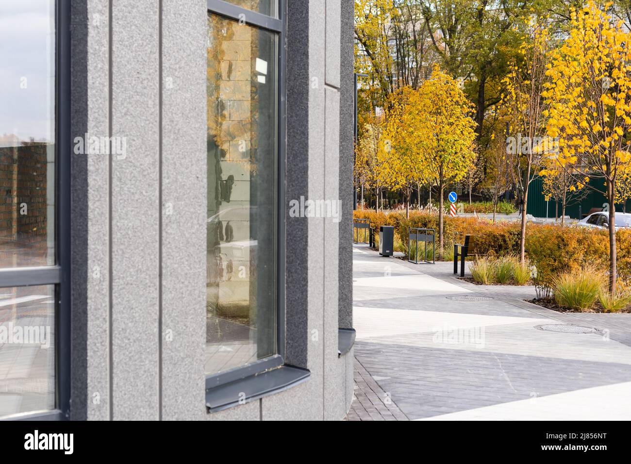apartment building complex in fall season with colorful autumn leaves ...