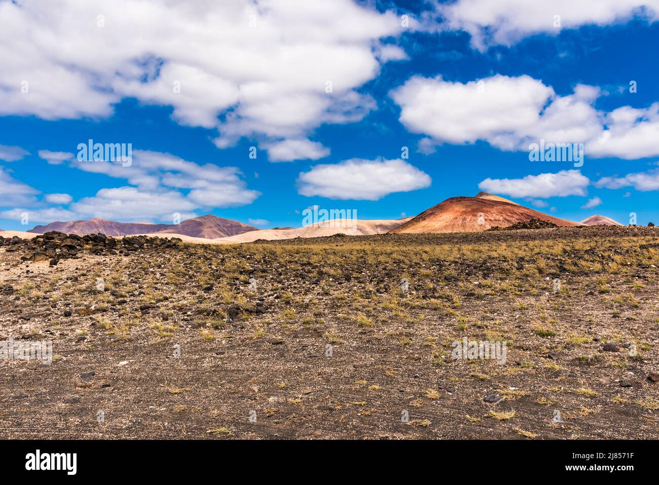 View of volcanic mountains at Puerto Calero, Lanzarote, Spain Stock ...