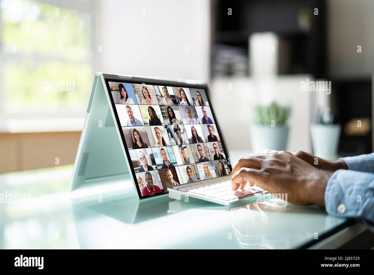 Virtual Video Conference Meeting Chat On Hybrid Laptop Stock Photo - Alamy
