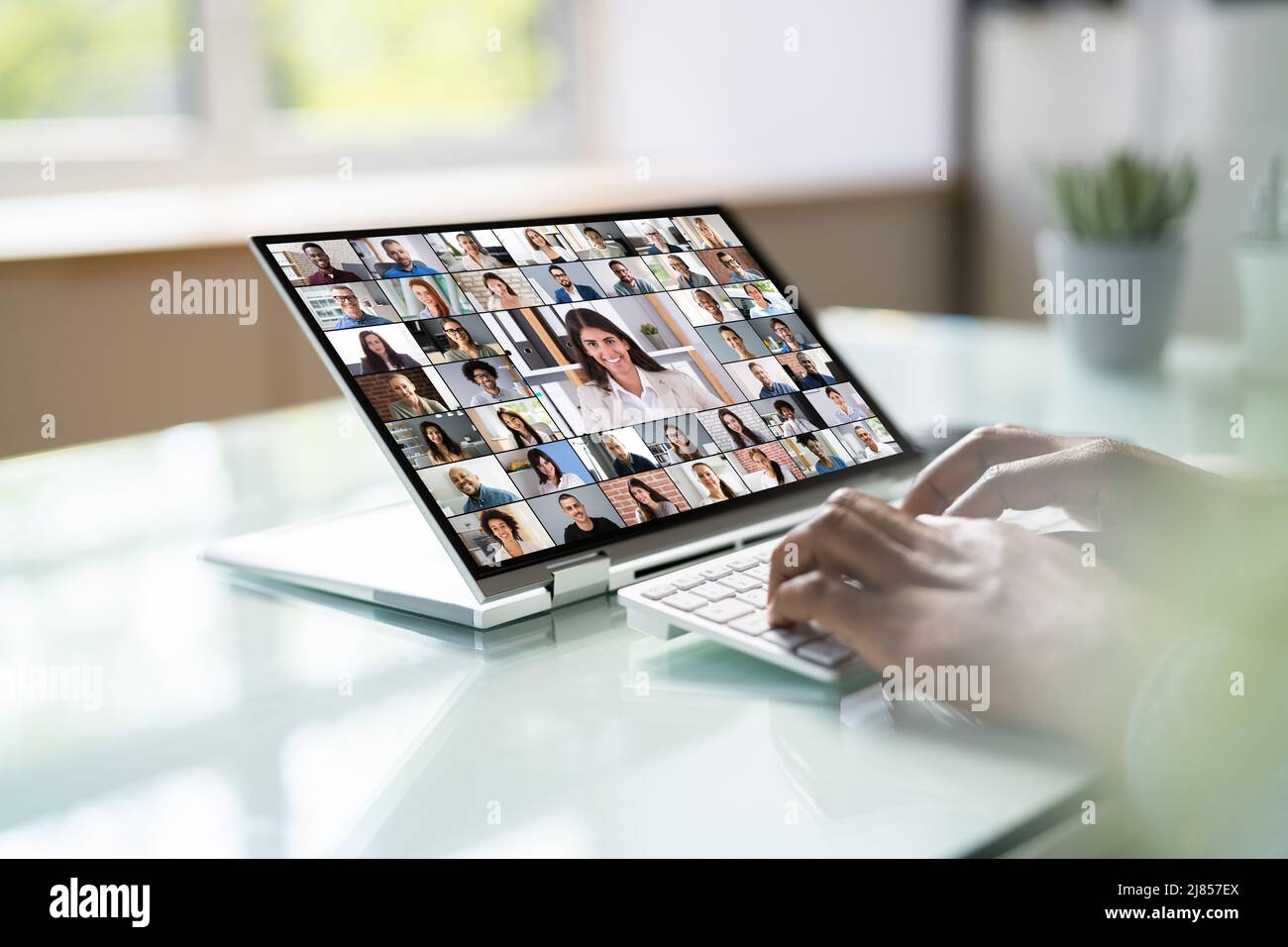 Virtual Video Conference Meeting Chat On Hybrid Laptop Stock Photo - Alamy