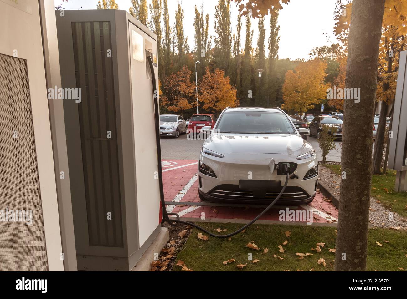eco green alternative electric vehicle of white color Stock Photo - Alamy