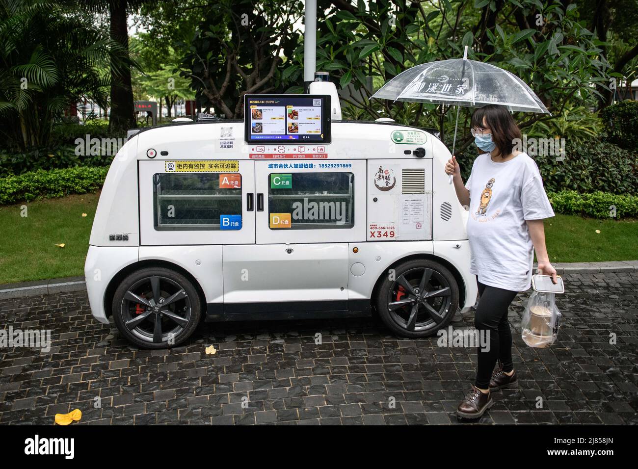 GUANGZHOU, CHINA - MAY 13, 2022 - A driverless food truck is seen on a ...